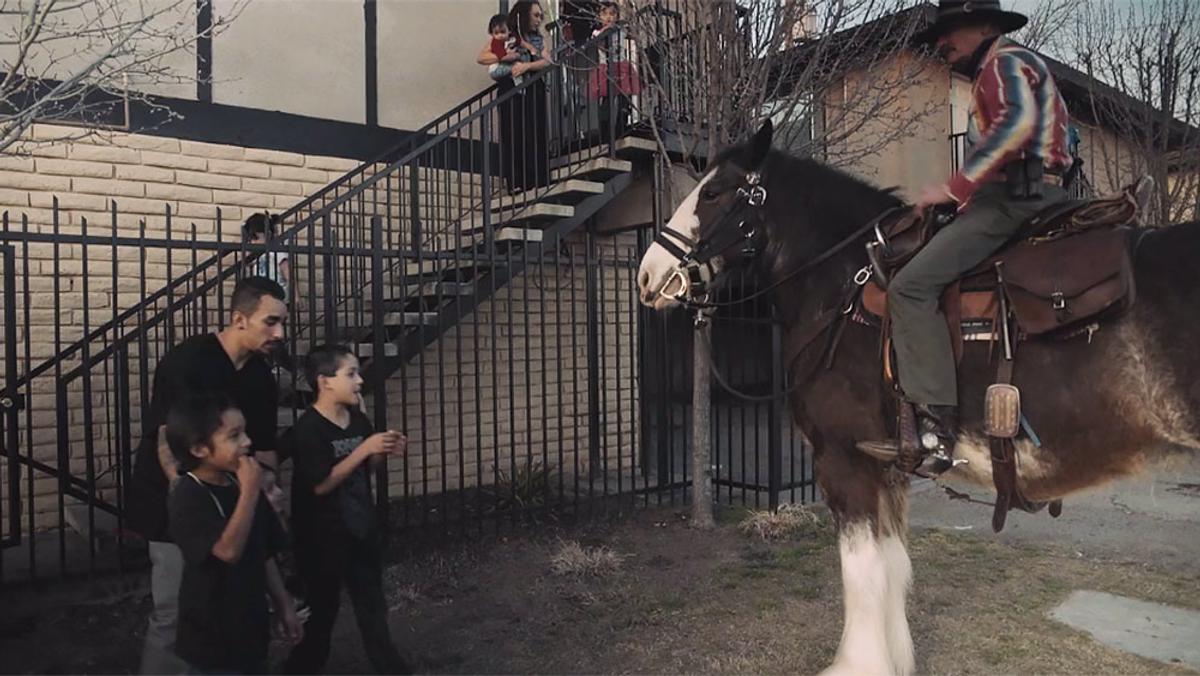 An urban cowboy rides through gang-ridden streets, preaching a gospel ...